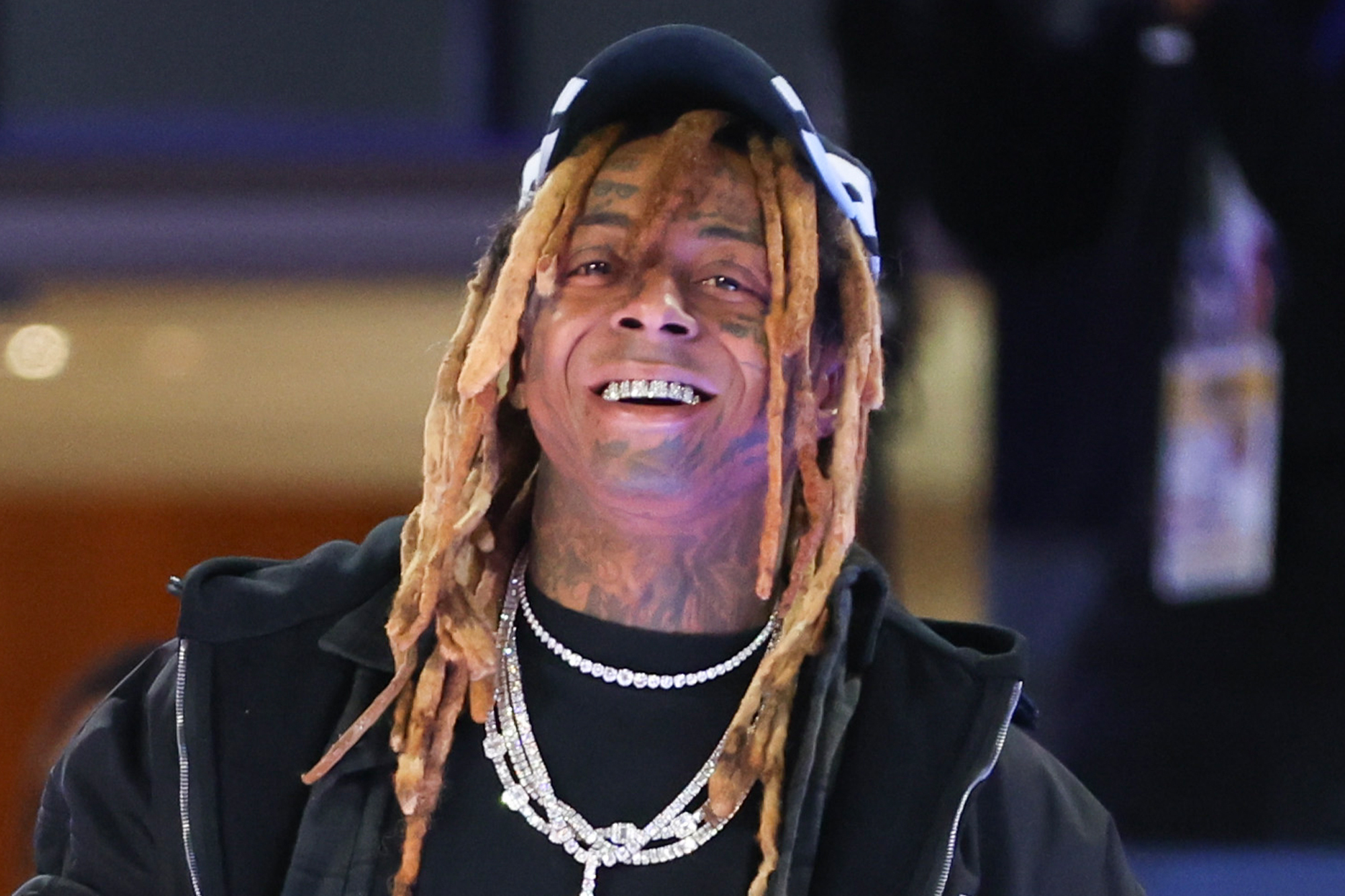 Lil Wayne, 43, secretly engaged to woman in her 20s: report - AOL
