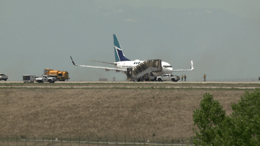 WestJet passengers evacuated on Denver runway after blown tires - AOL
