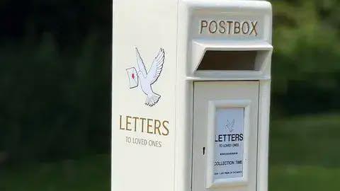 White postbox for letters of grieving families - AOL