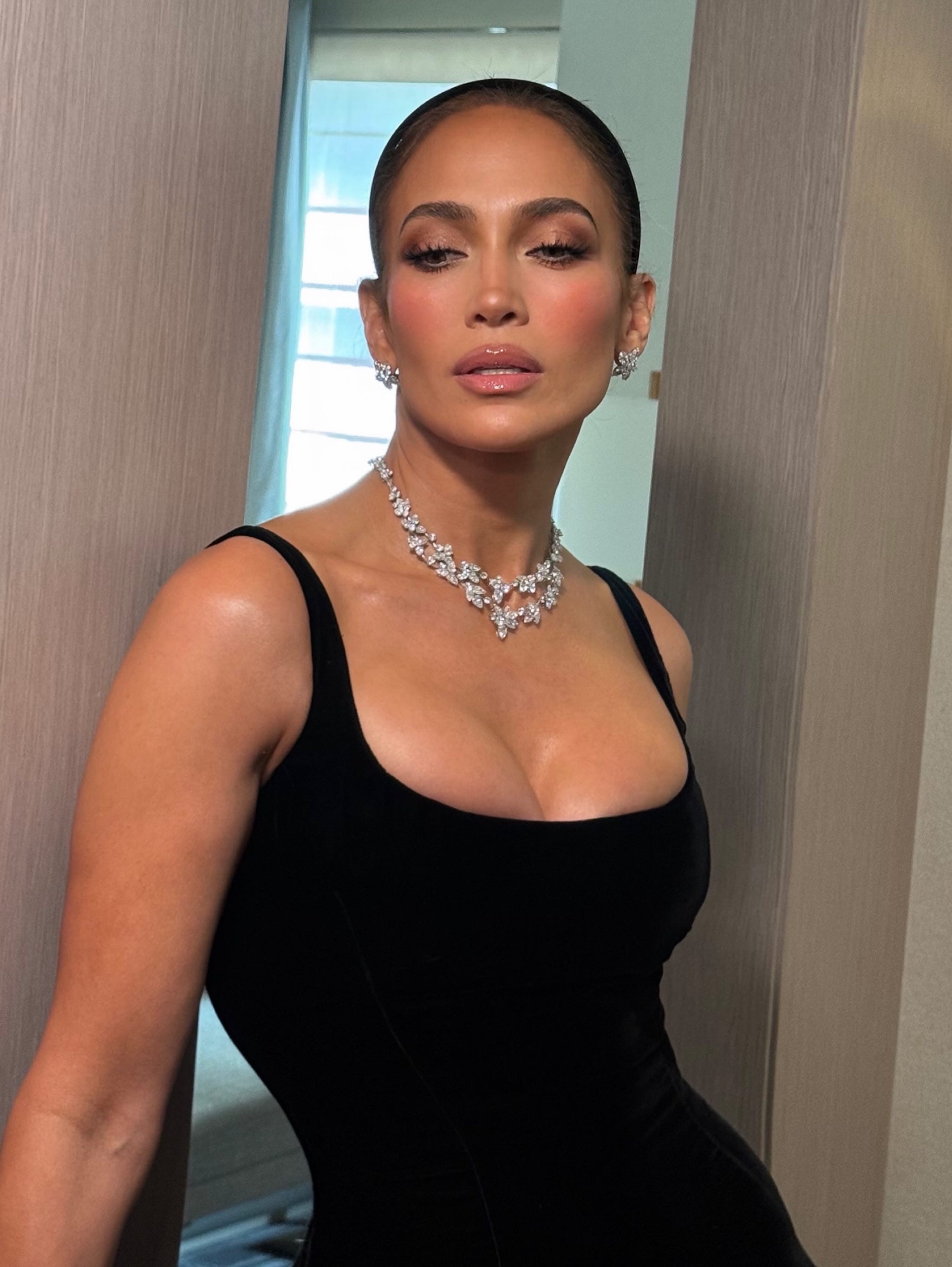 Jennifer Lopez Wears Glamorous Body-Hugging Black Gown to Taylor Swift ...